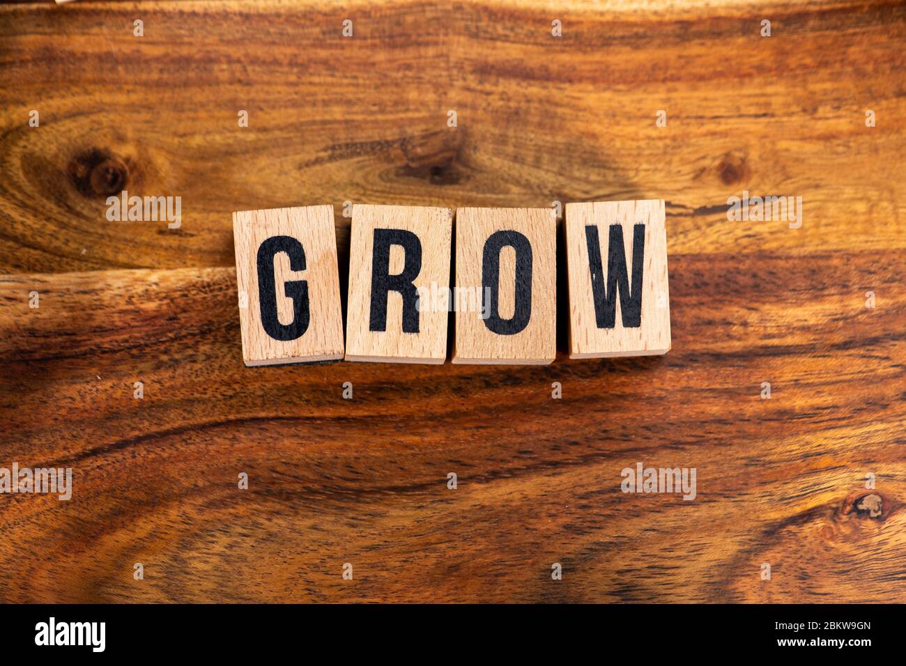 Grow text made wooden hi-res stock photography and images - Alamy