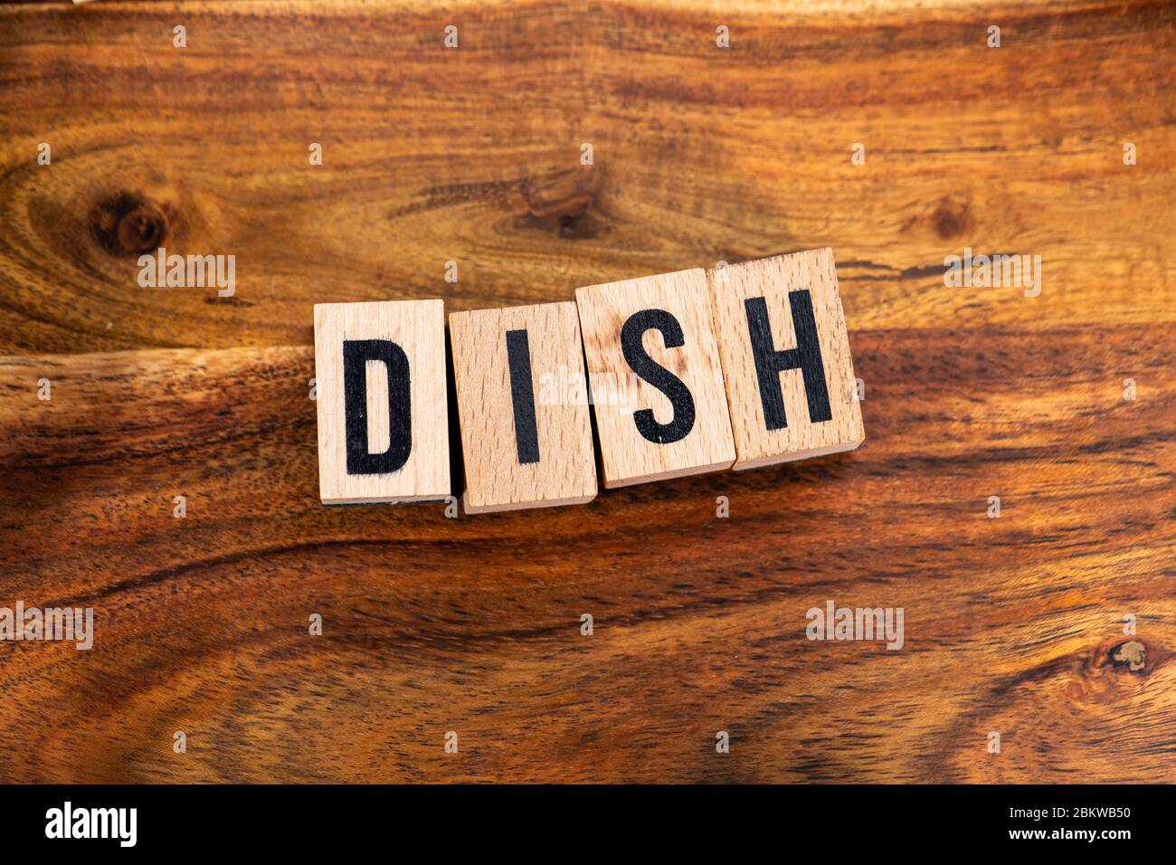 " DISH " text made of wooden cube on wooden background Stock Photo - Alamy