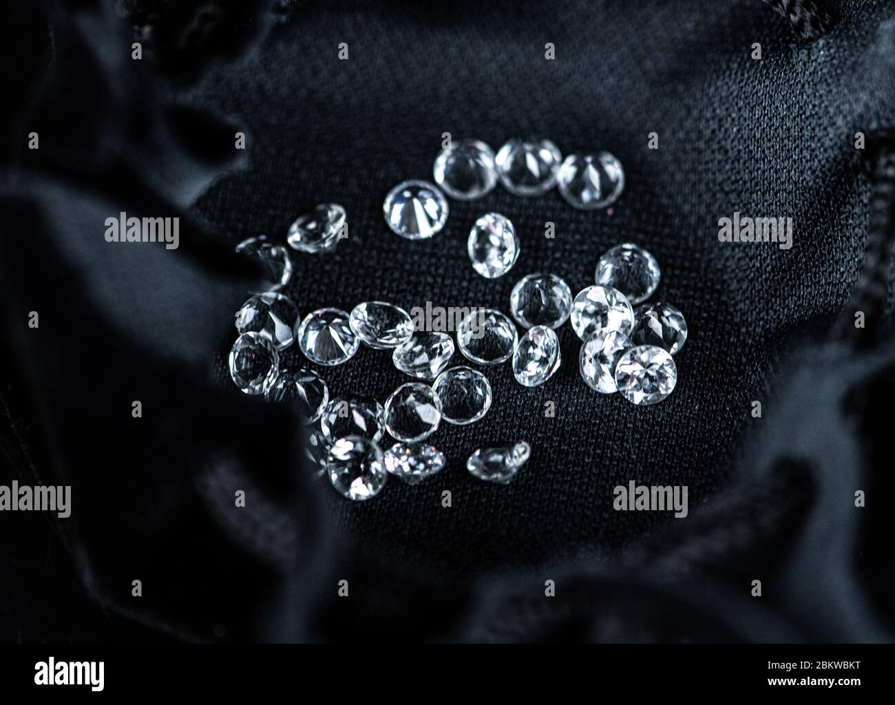 Small Diamonds on dark background as close up shot (selective focus ...