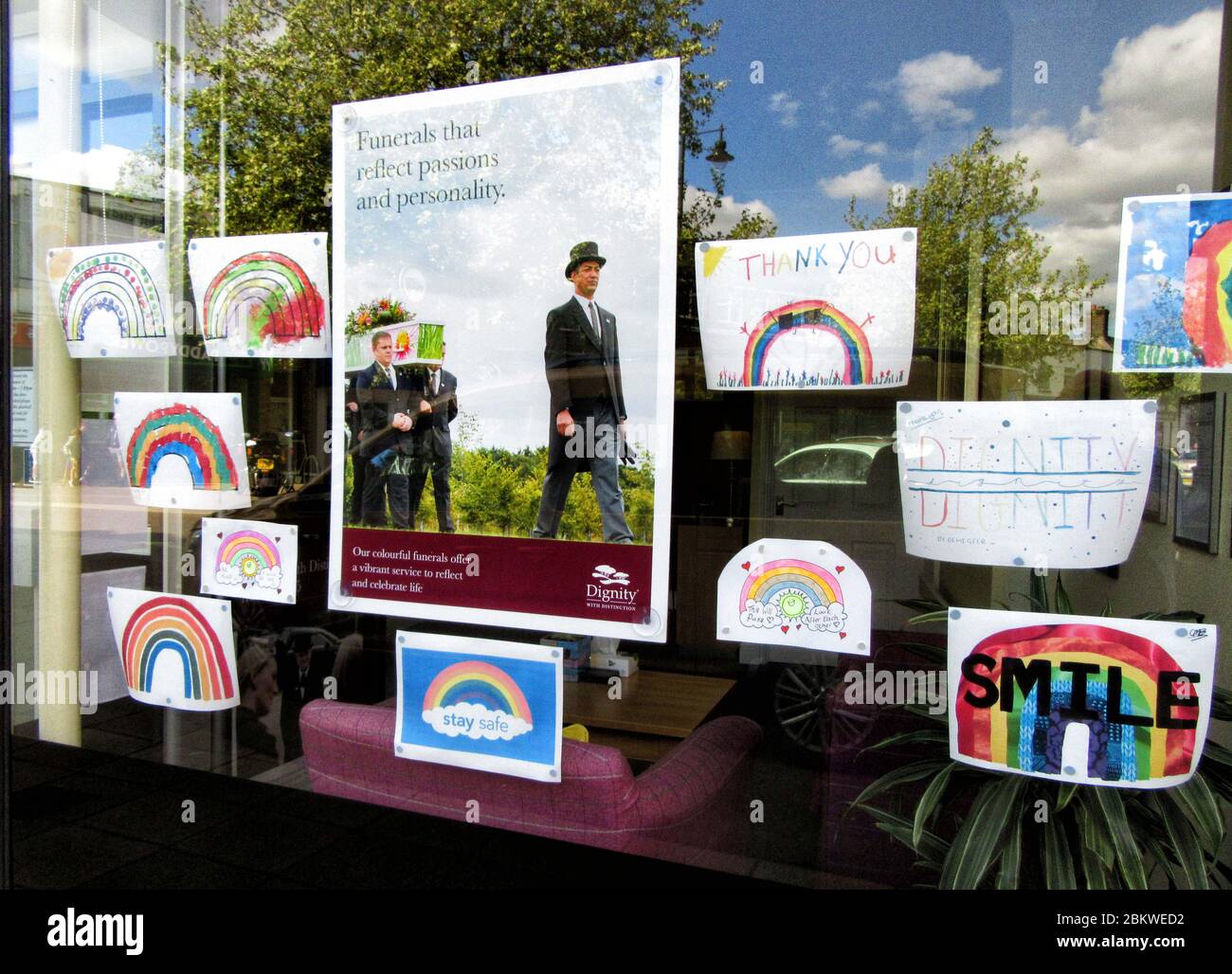London, UK. 3rd May, 2020. An insensitive sign in a window of funeral ...