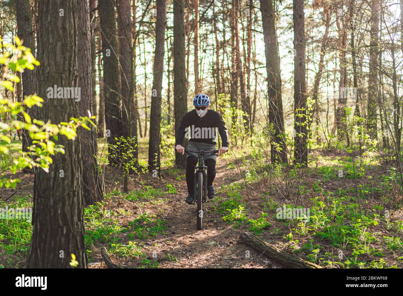 Sport. Mountain Bike cyclist riding single track. Man on bike wearing ...