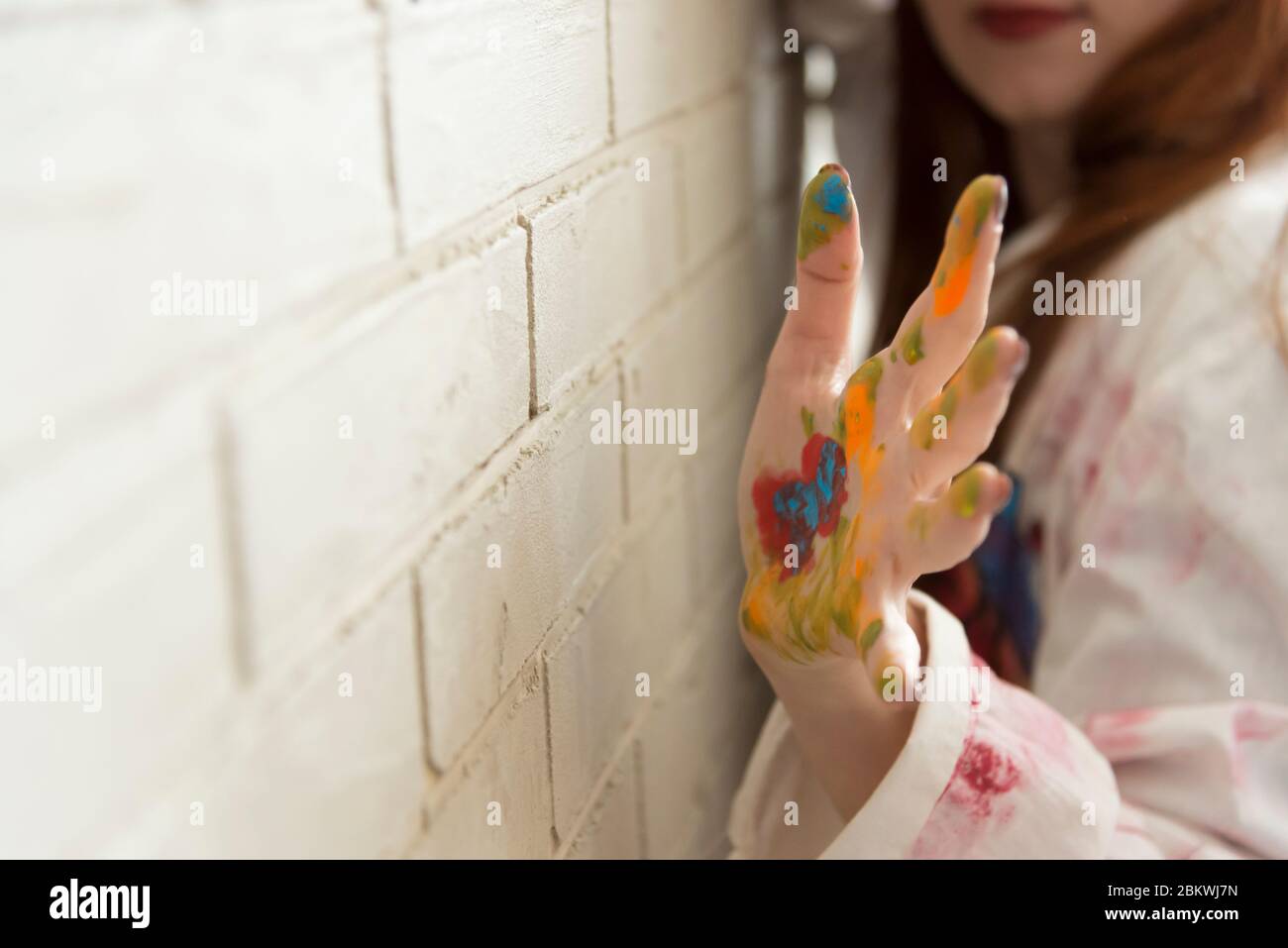 Woman smeared with bright hi-res stock photography and images - Alamy