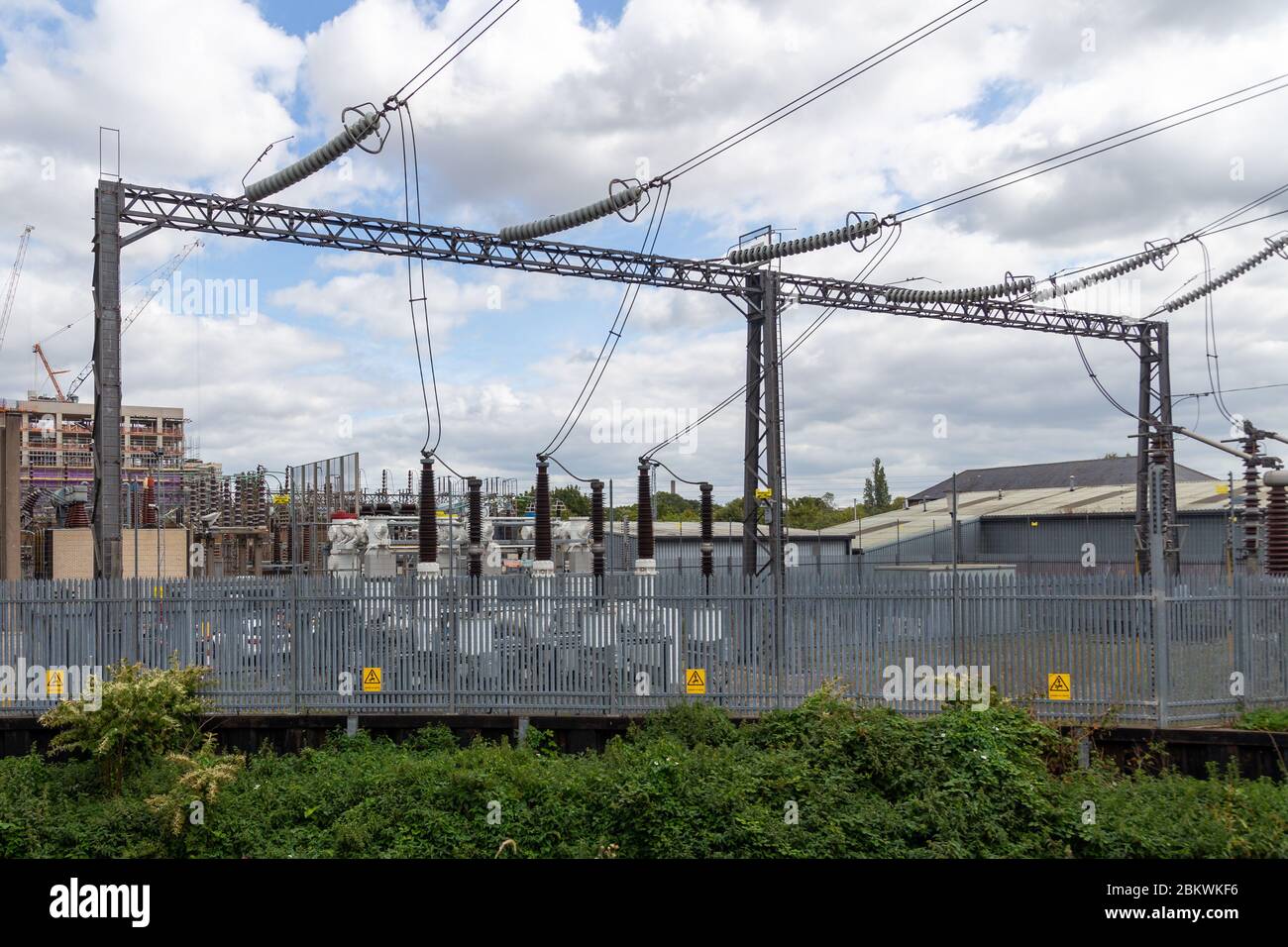 High voltage electrical cables and insulators in a power substation ...