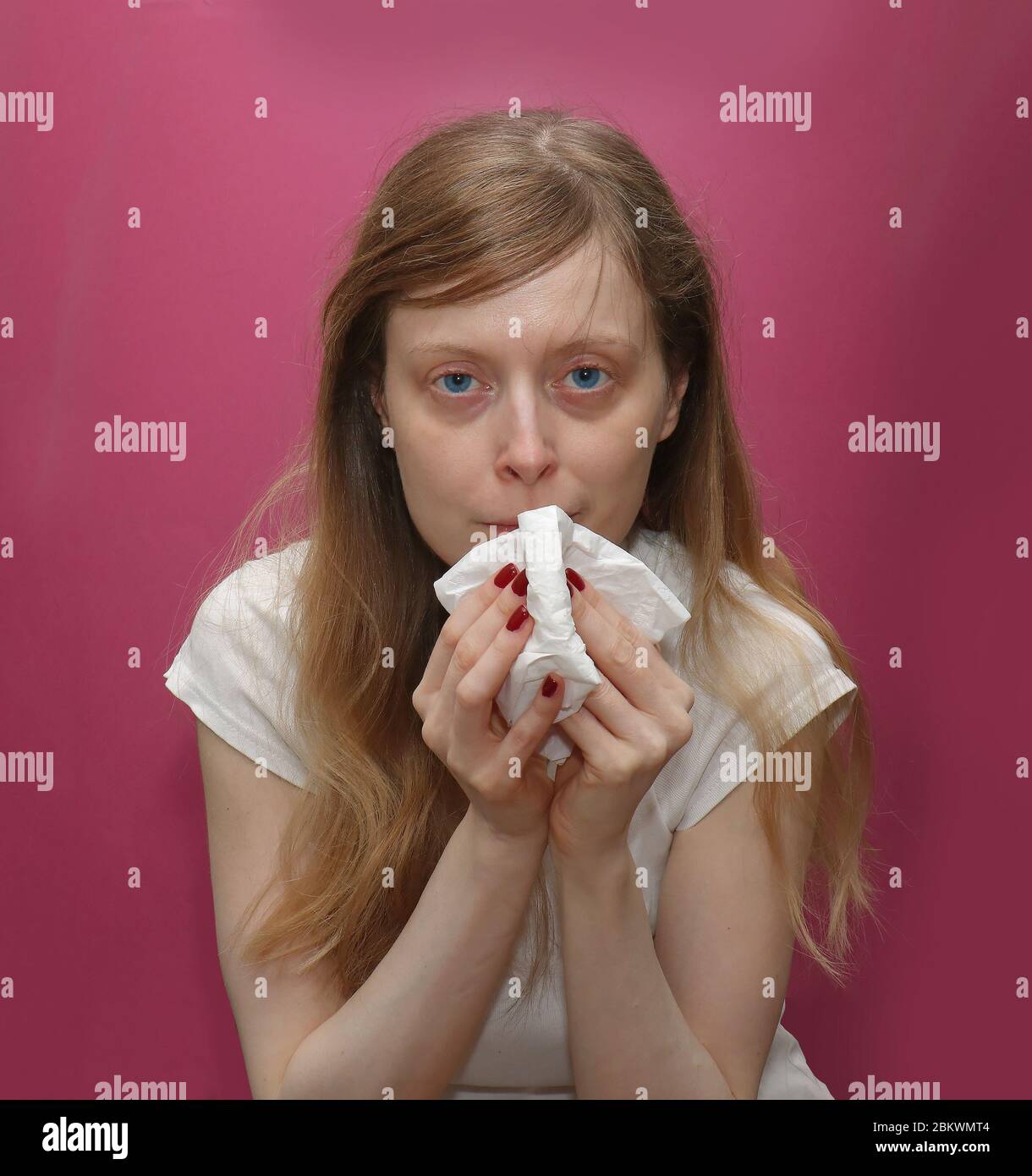 Girl blowing nose tissue paper hi-res stock photography and images - Alamy