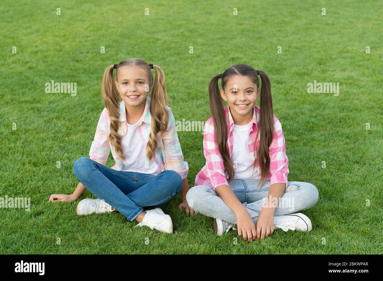 Sisterhood and friendship. We are friends. Cheerful schoolgirls on ...