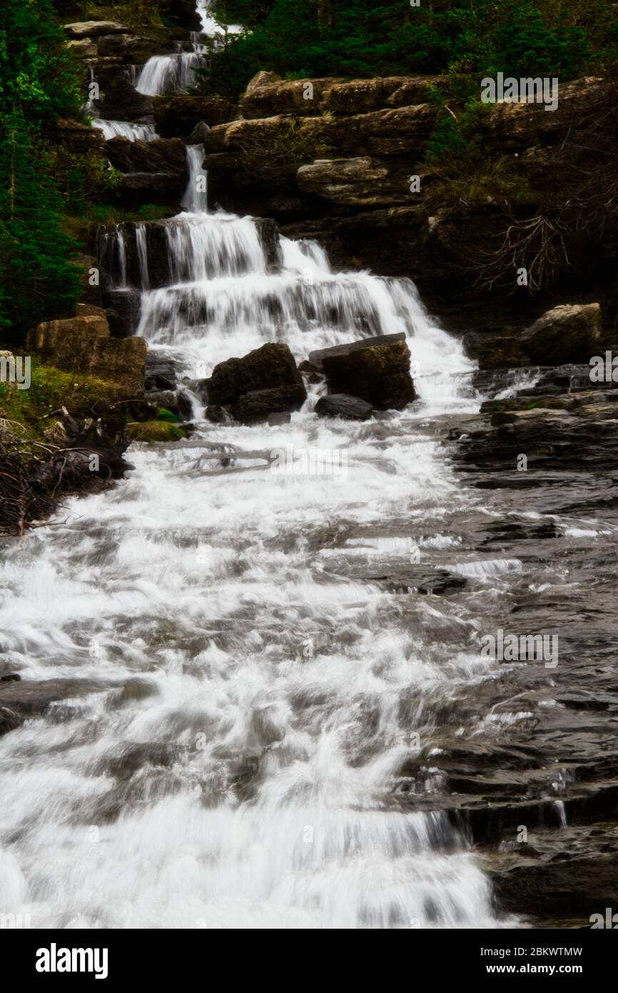 Cascading Mountain Waterfall in Spring Stock Photo - Alamy