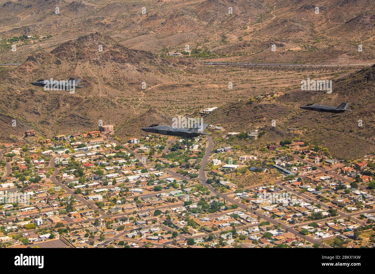 Three F-35A Lightning IIs fly in formation as part of the Air Force ...