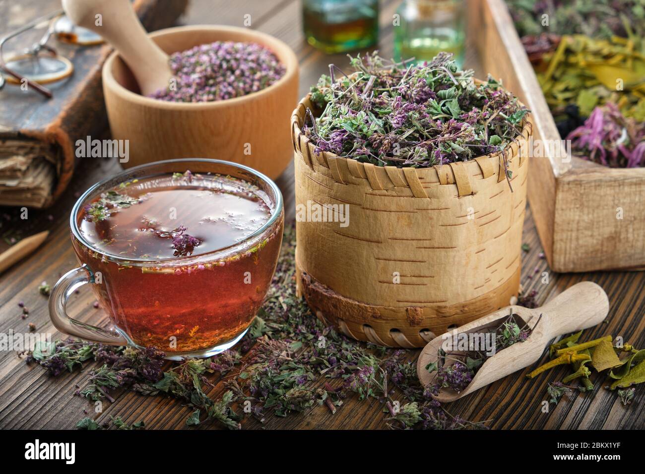 Cup of tea with wild Marjoram and Erica flowers. Dry Origanum vulgare ...