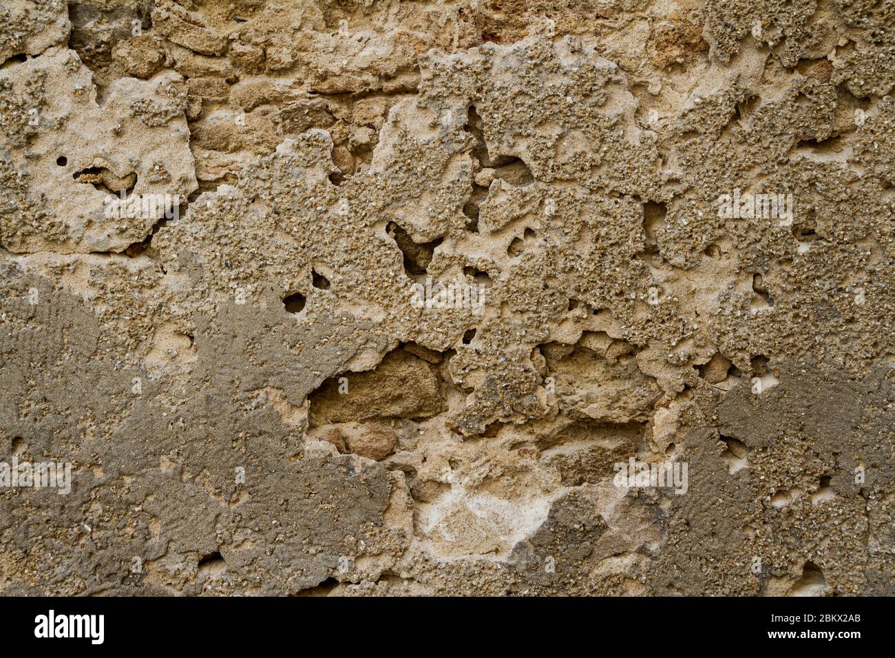 Detail of a very rough and aged stucco wall Stock Photo - Alamy