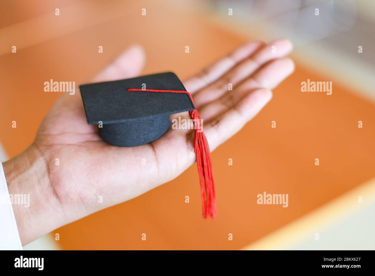 Graduation cap gown scroll hi-res stock photography and images - Alamy