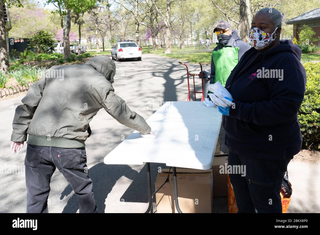NEW YORK, NY - MAY 5, 2020: A man receives free face masks from NYC ...