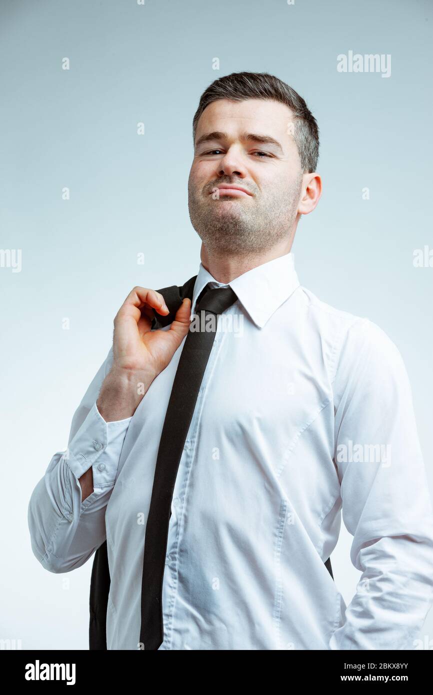 Man jacket slung over shoulder hi-res stock photography and images - Alamy
