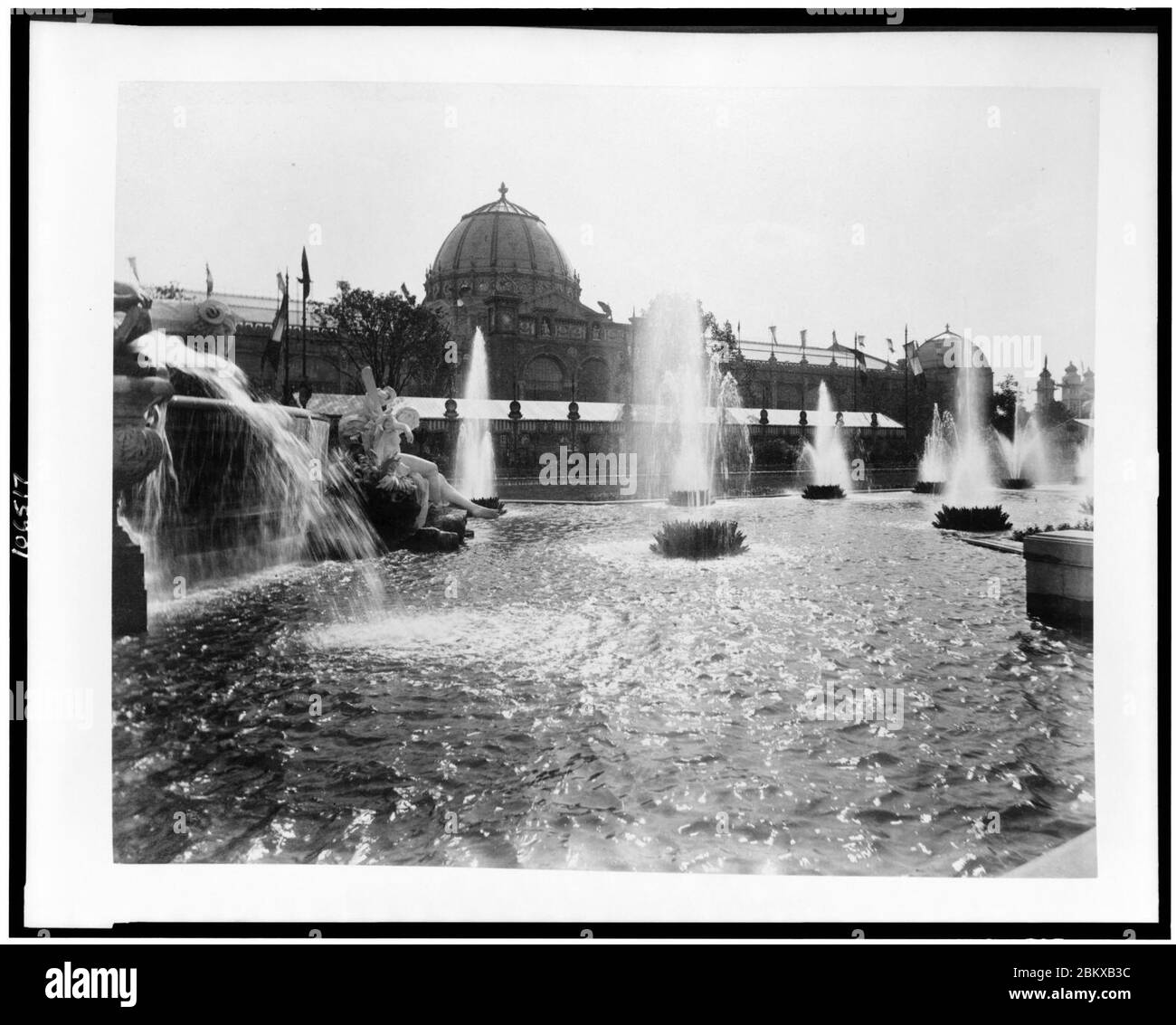 Illuminated fountains in foreground, and the Palace of Liberal Arts in ...