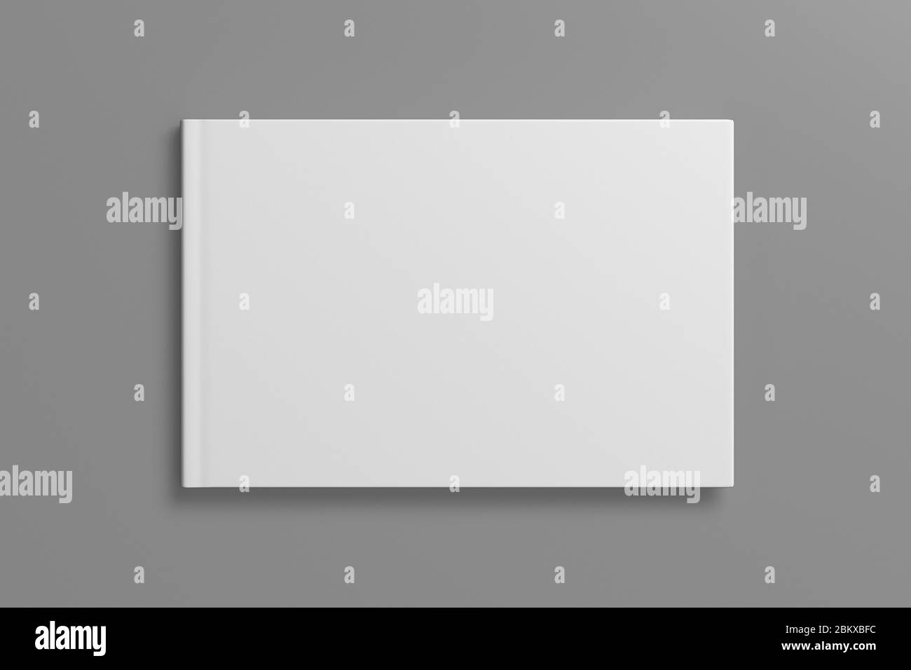 Blank horizontal book cover mock up on gray background. View directly ...