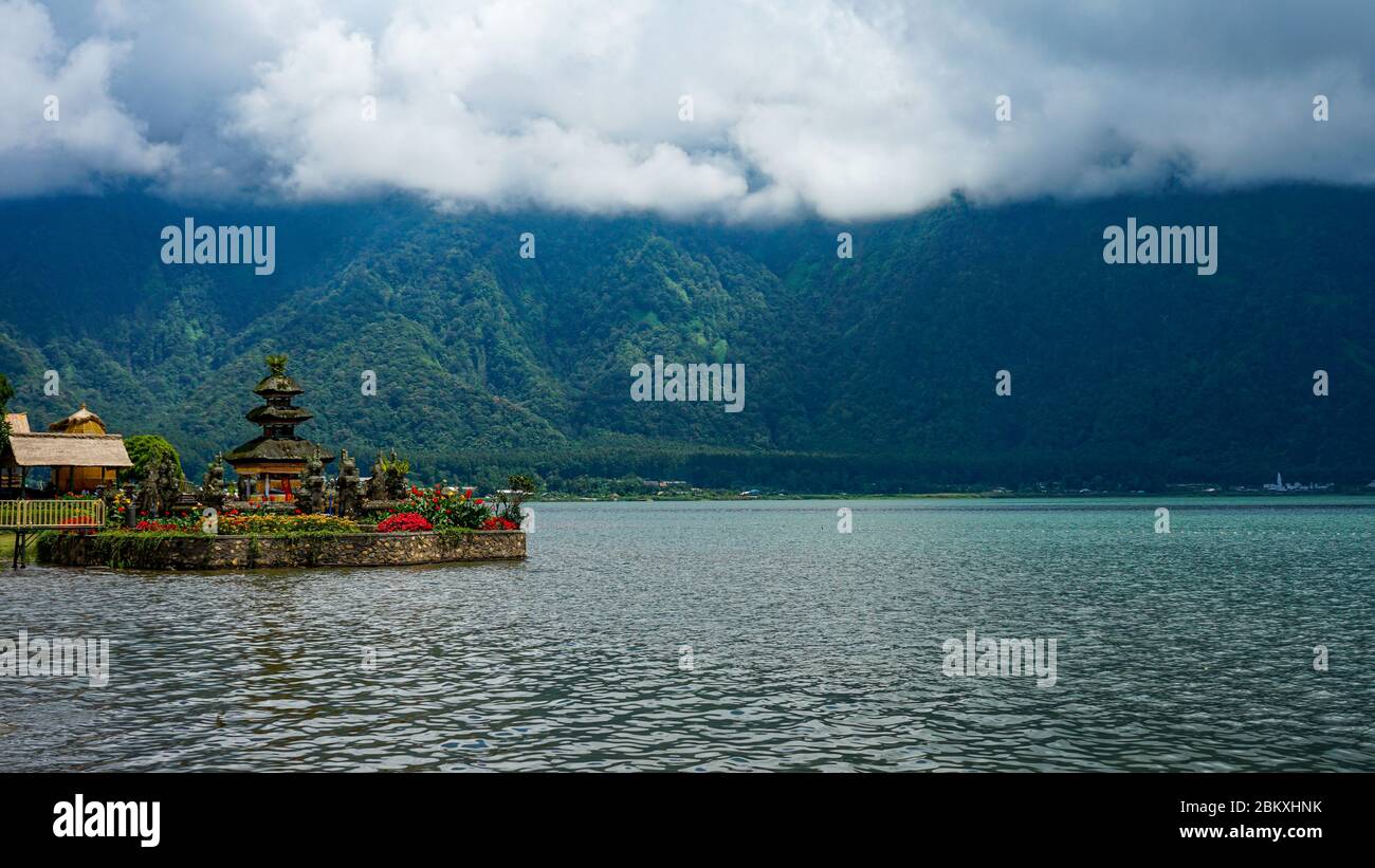 Hindu temple by the lake Stock Photo - Alamy