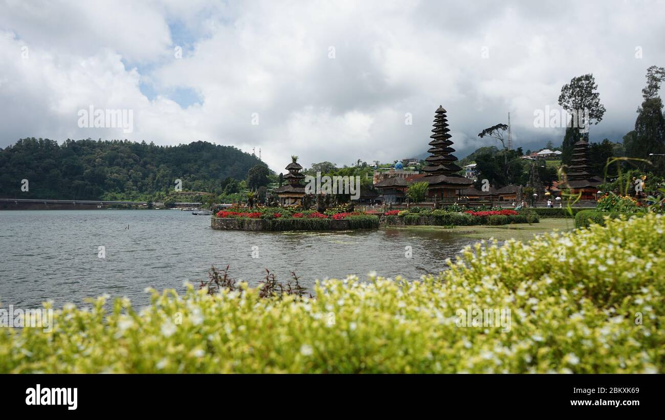Hindu temple by the lake Stock Photo - Alamy