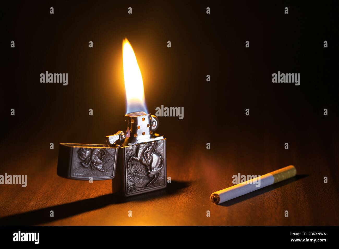 Beautiful Lighter And Cigarette On A Wooden Floor And Lighter's Fire Is ...