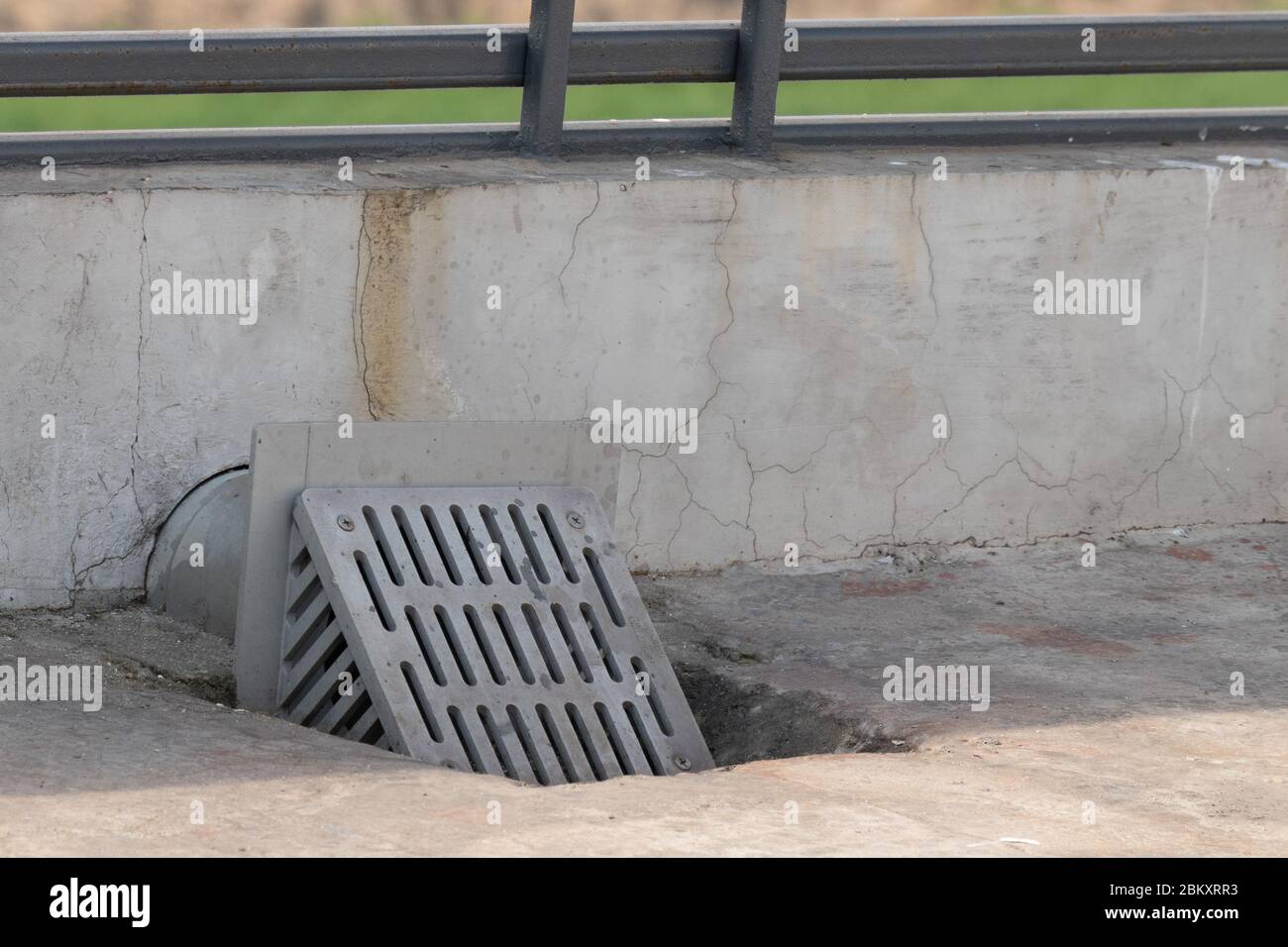 Square steel terrace water drain cover or grating installed Stock Photo ...
