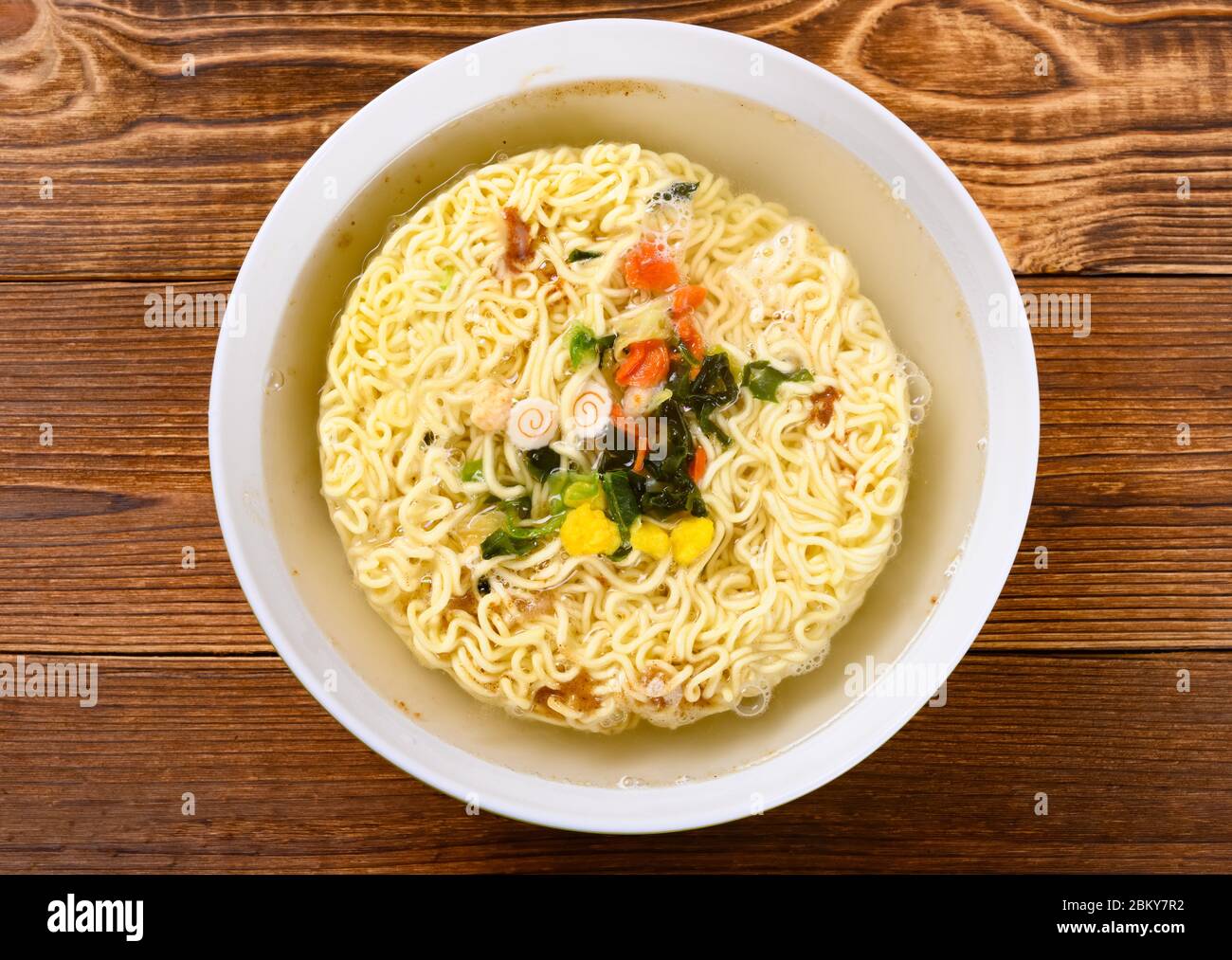 top view instant noodles with water in a bowl Stock Photo - Alamy