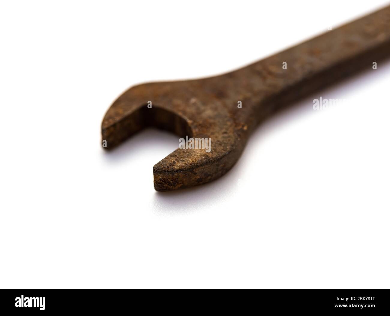 rusty spanner on a white background Stock Photo - Alamy