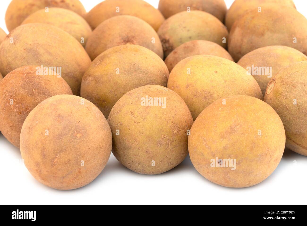 Chikoo or sapodilla fruit isolated on white background Stock Photo - Alamy