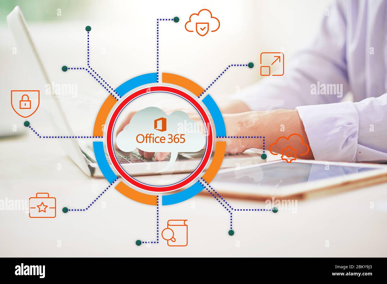 Faceless side view of man in shirt typing on laptop sitting at desk in ...