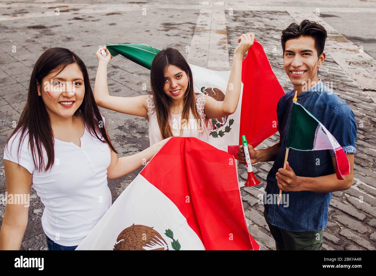 mexican guys cheering Viva Mexico on independence day in Mexico city ...