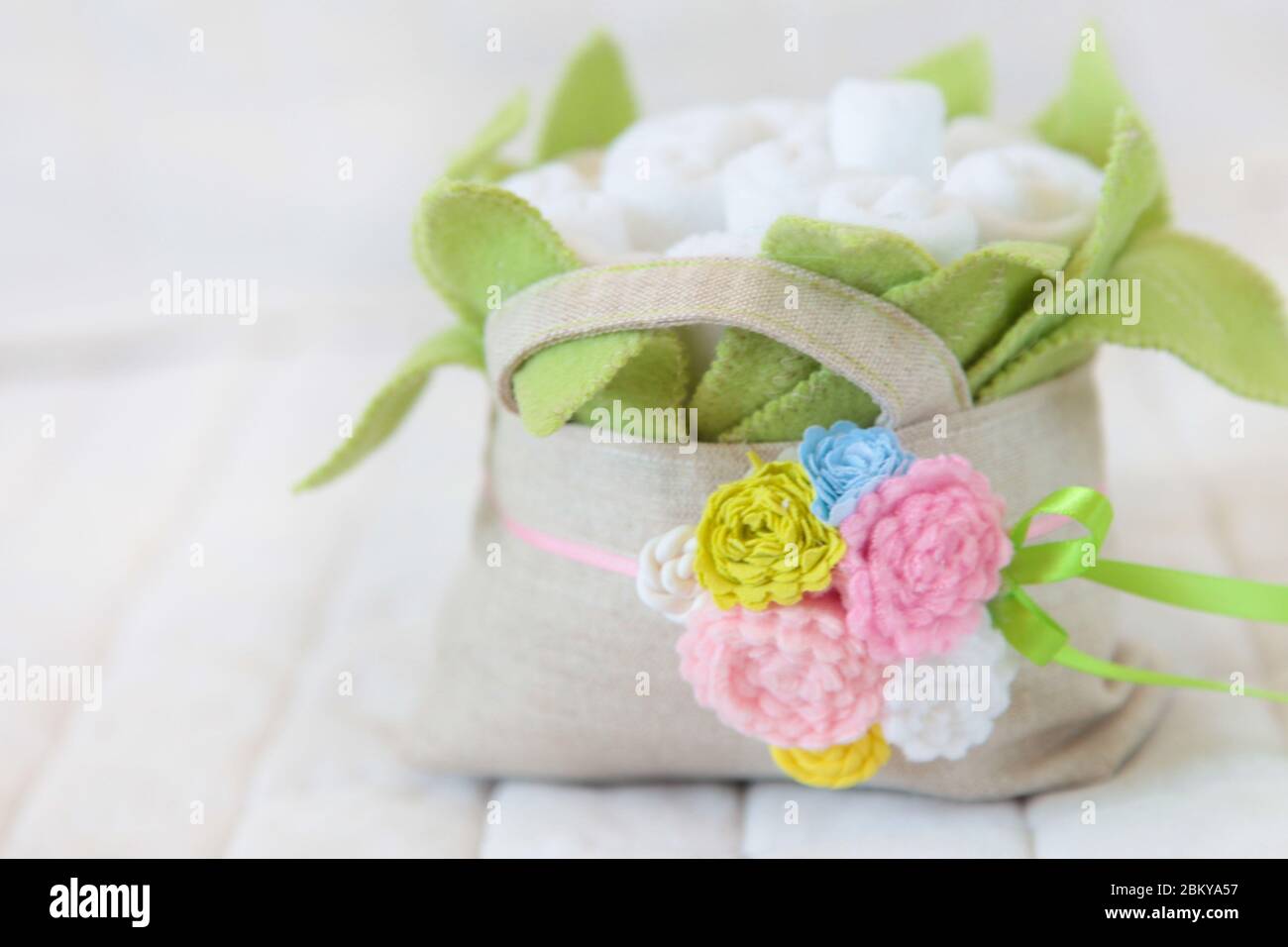 Handmade toy. flowers basket of textiles, fabrics and yarn. Flowers ...