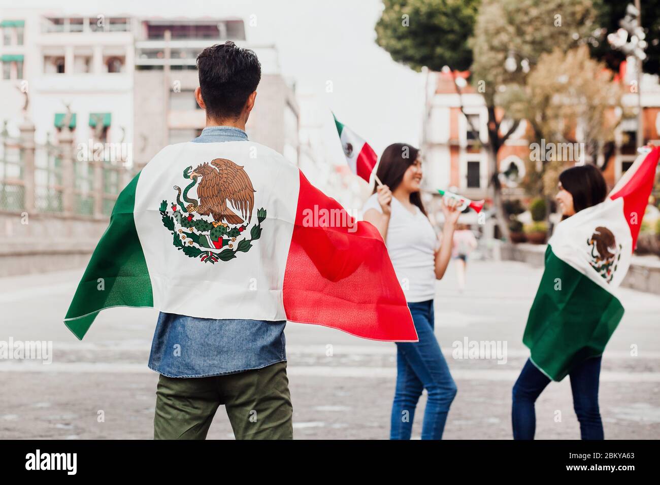 mexican guys cheering Viva Mexico on independence day in Mexico city ...