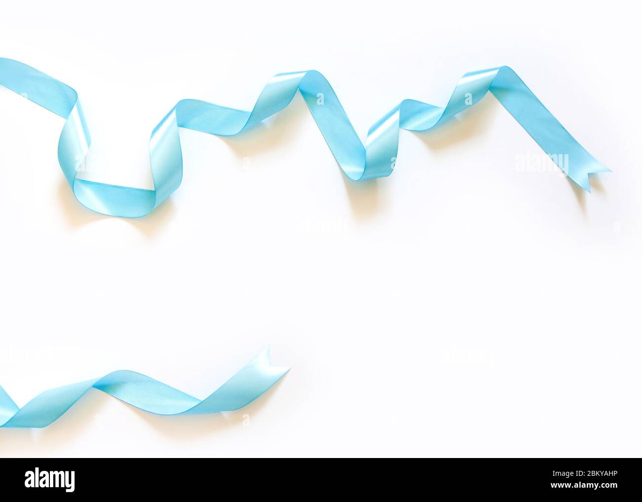 Frame made of blue satin ribbon with a bow. White background Stock ...