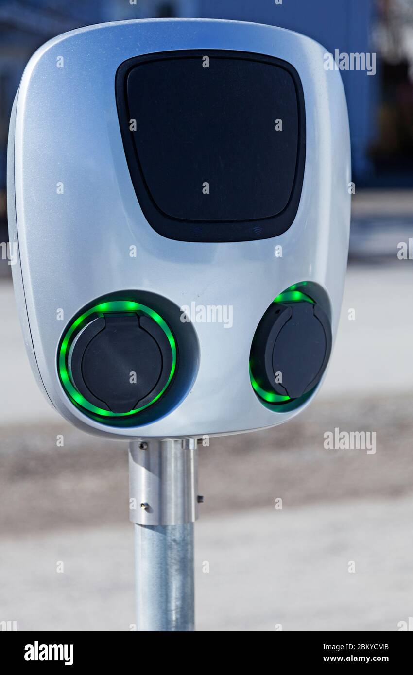 Electric vehicle charger high street hi-res stock photography and ...