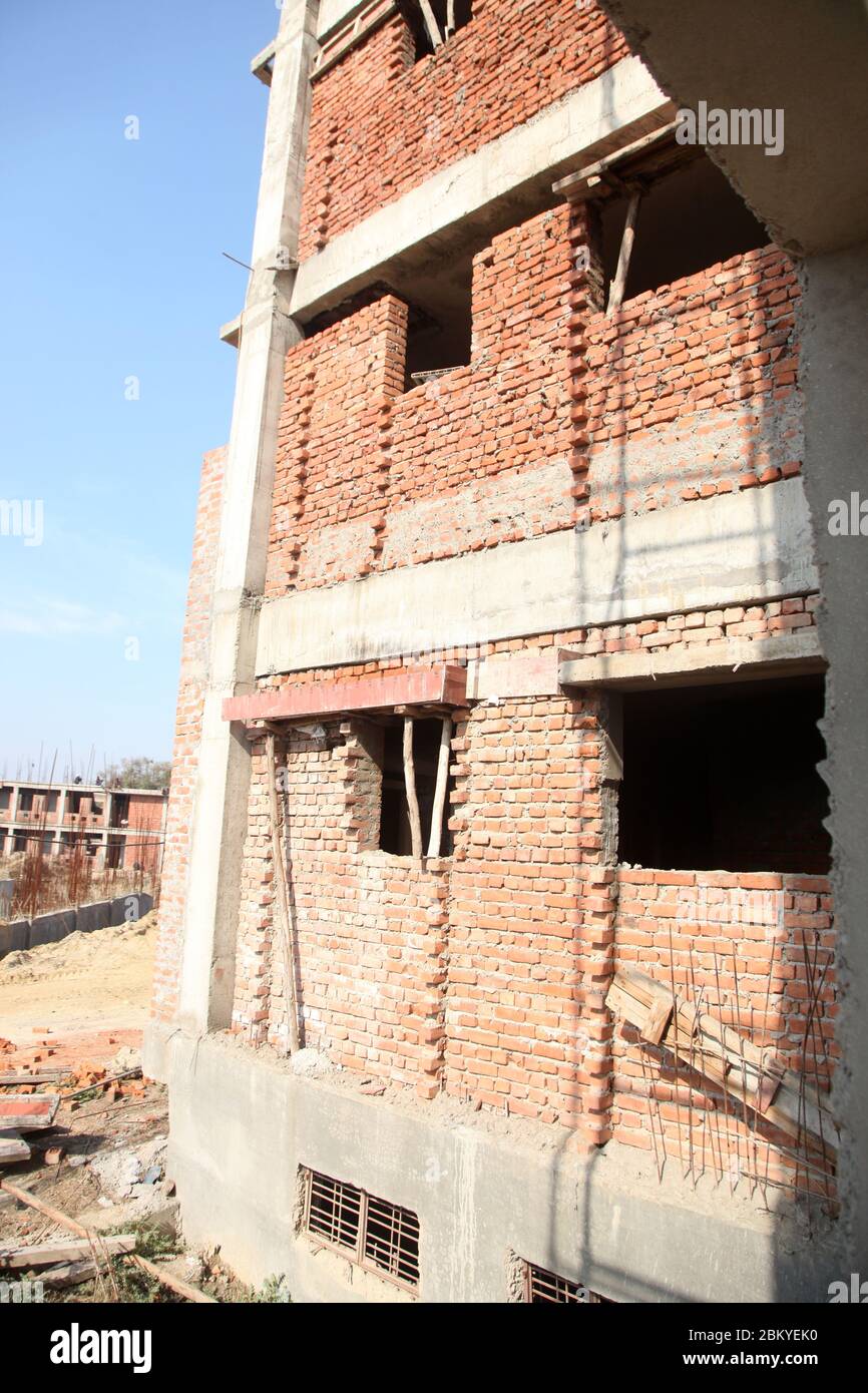 Workers under construction building project, Infrastructure projects ...