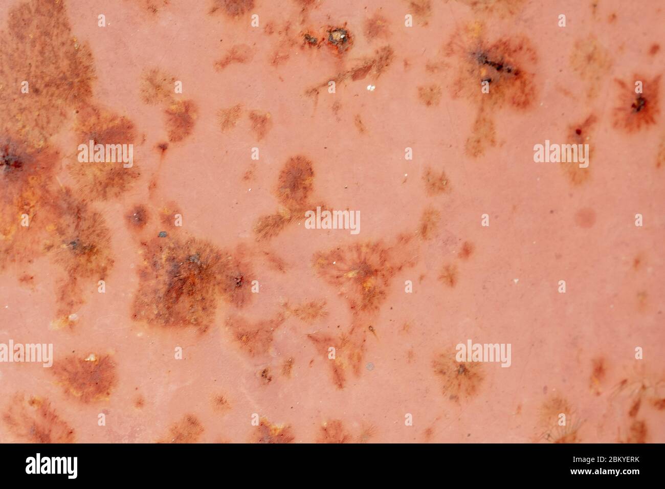 Bright rust stains texture paint showing through to rust underneath ...