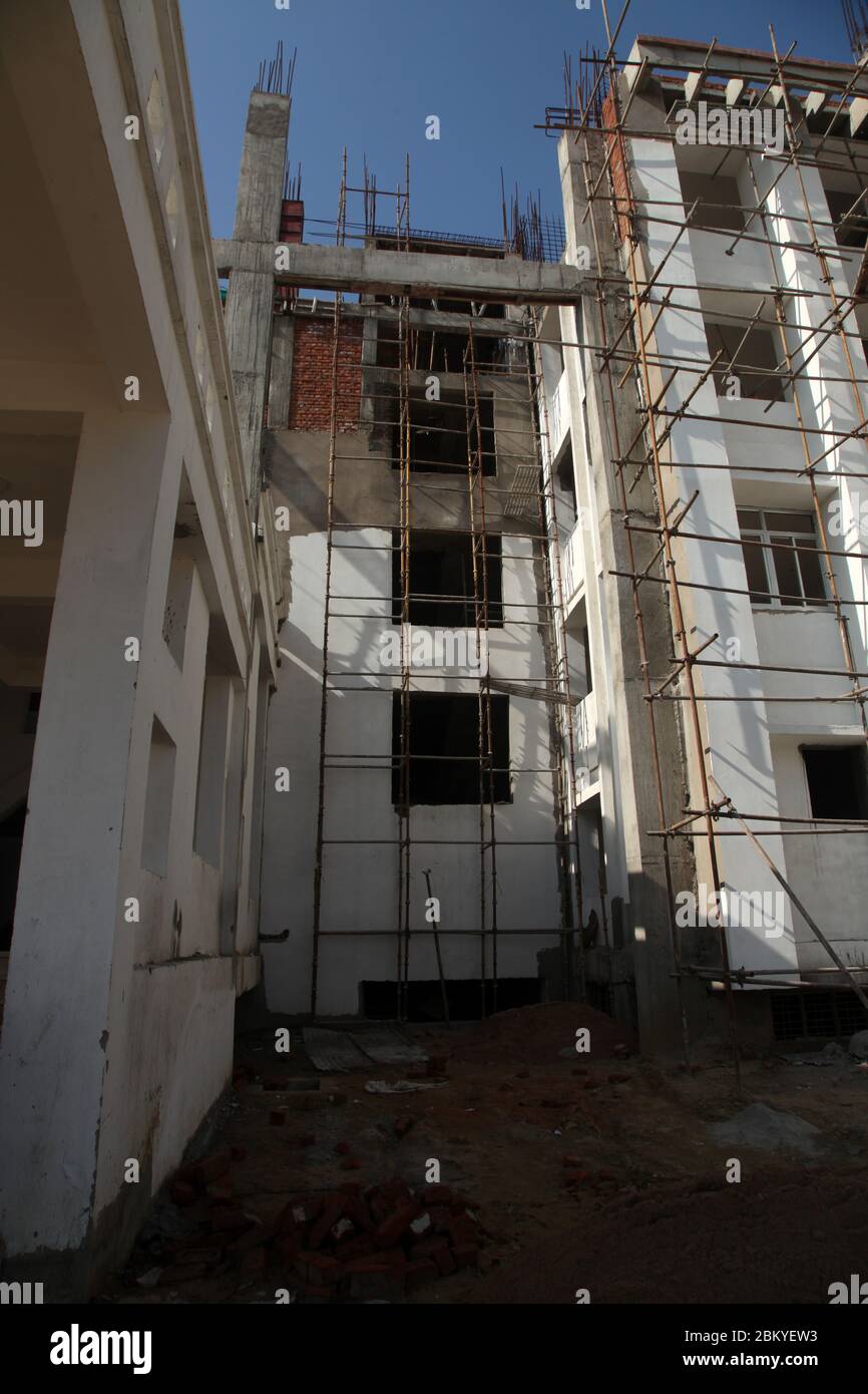 Workers under construction building project, Infrastructure projects ...