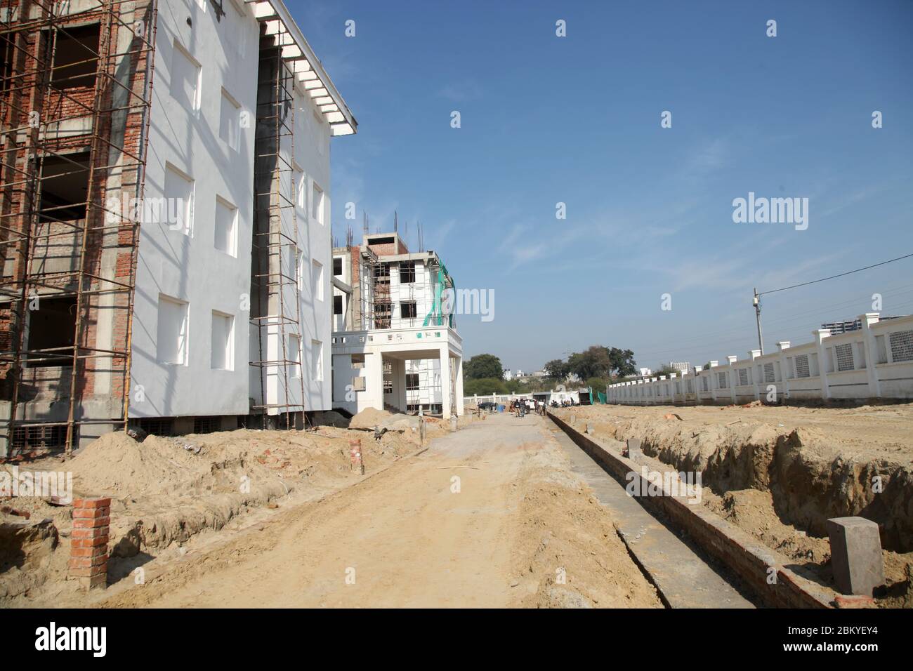 Workers under construction building project, Infrastructure projects ...