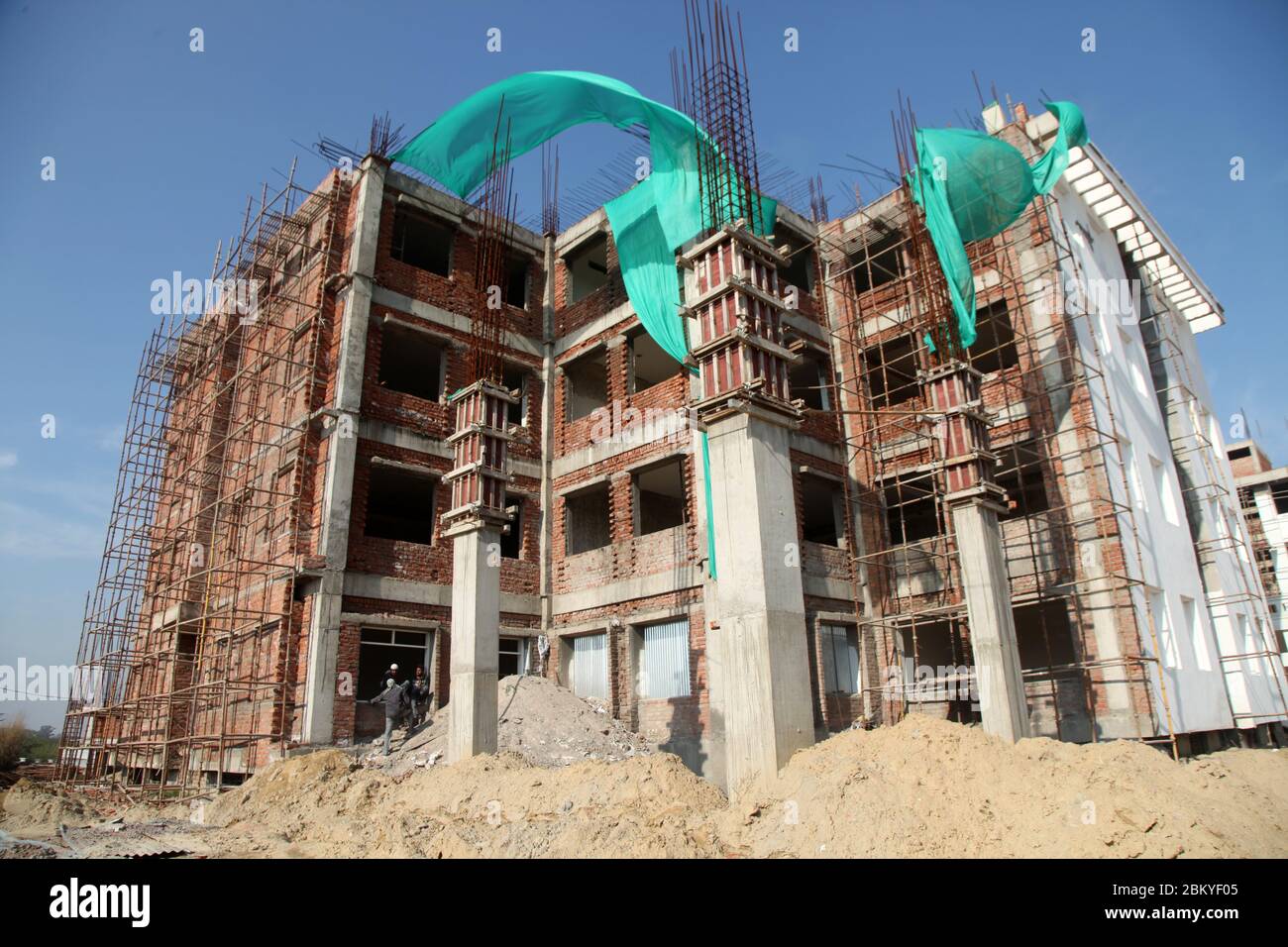 Workers under construction building project, Infrastructure projects ...
