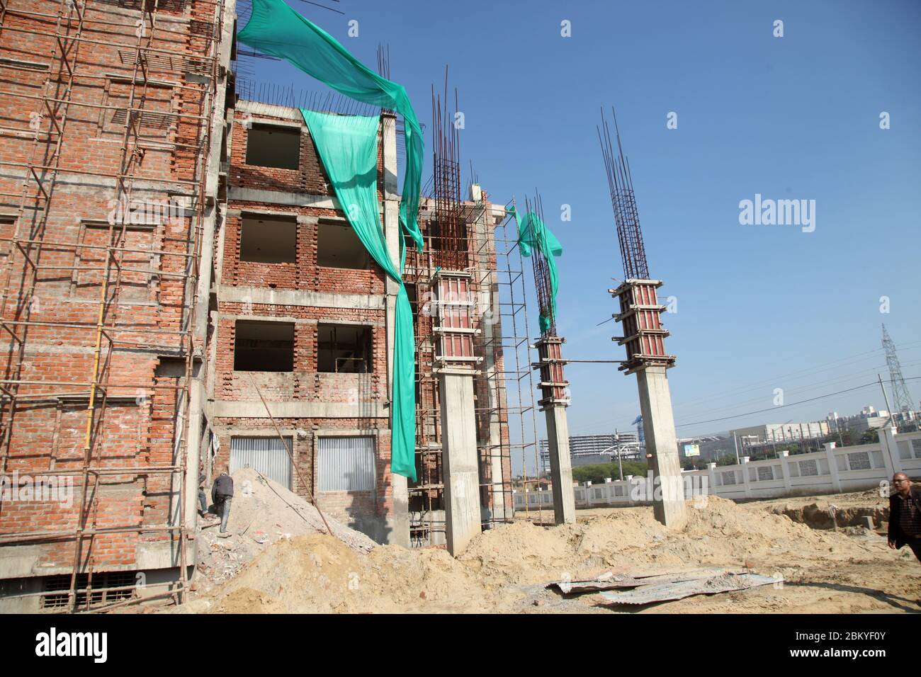 Workers under construction building project, Infrastructure projects ...
