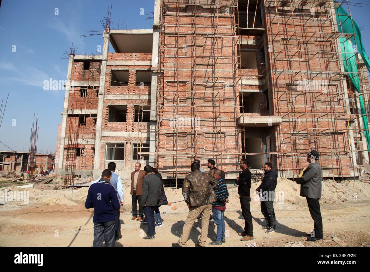 Workers under construction building project, Infrastructure projects ...