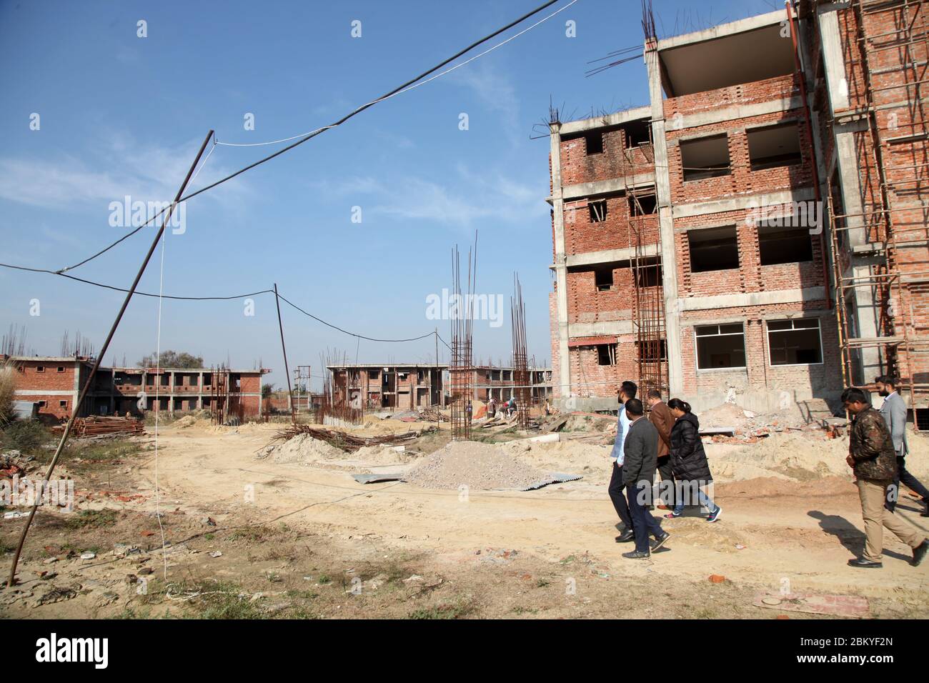 Workers under construction building project, Infrastructure projects ...