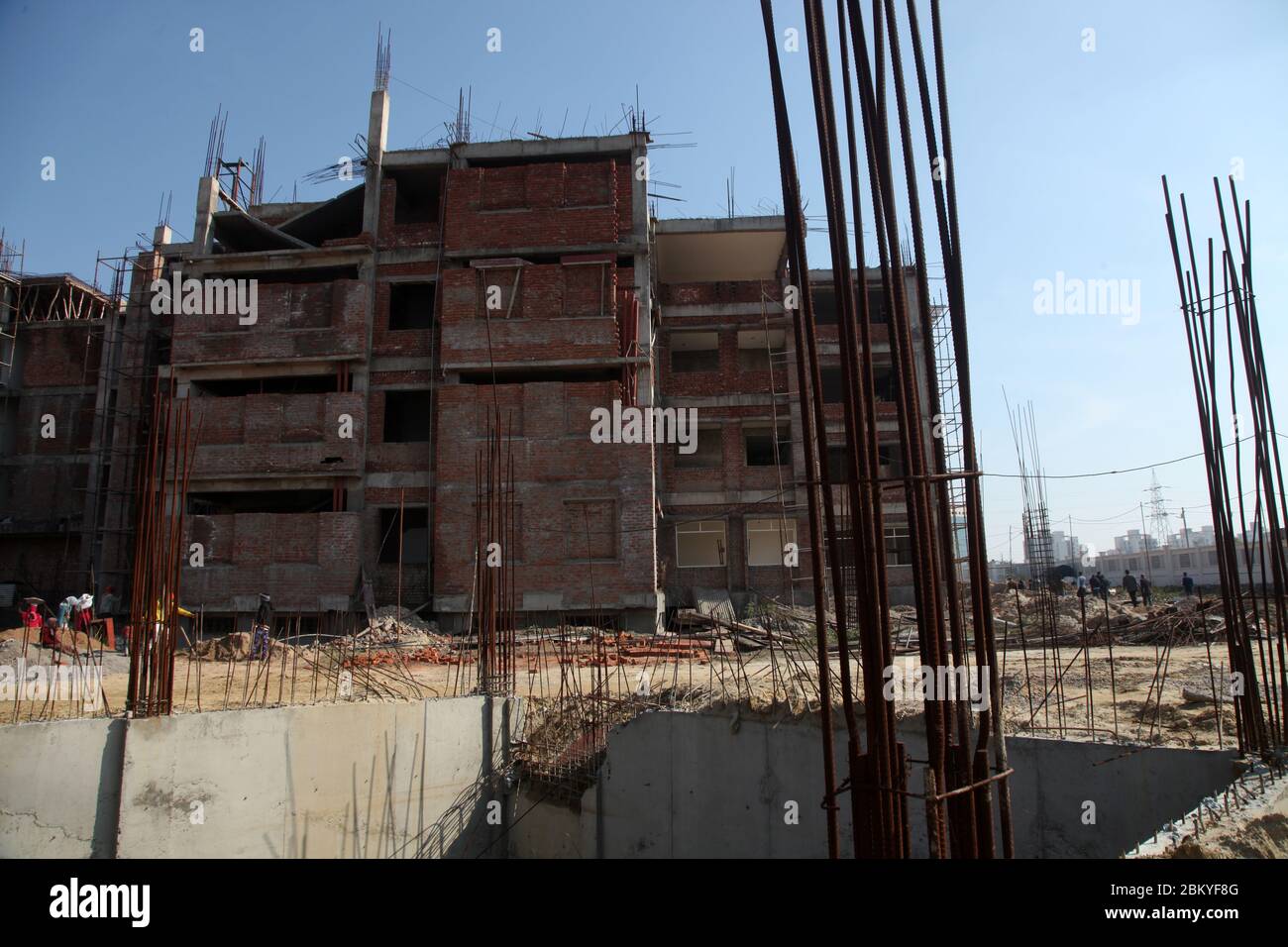 Workers under construction building project, Infrastructure projects ...