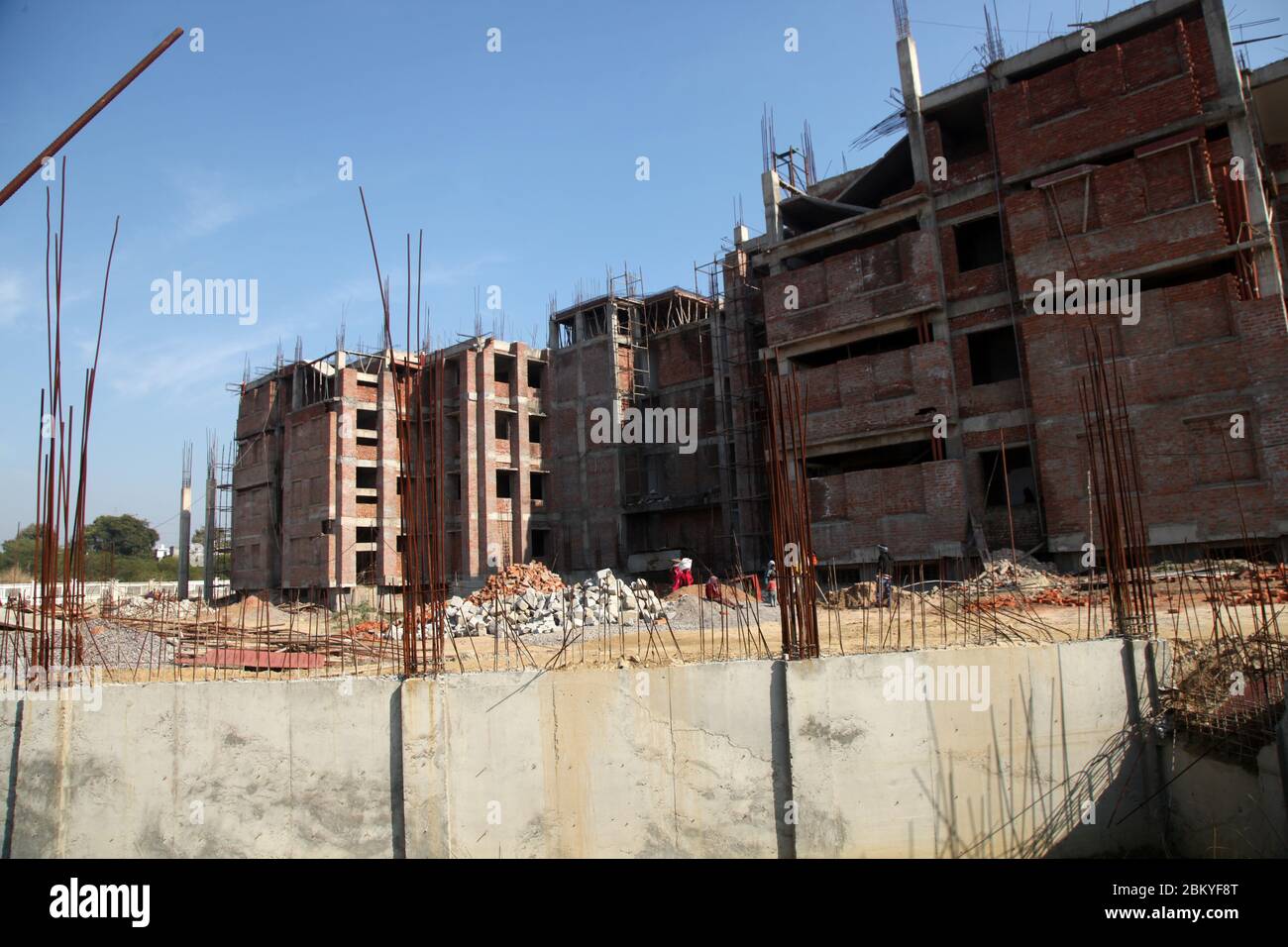 Workers under construction building project, Infrastructure projects ...