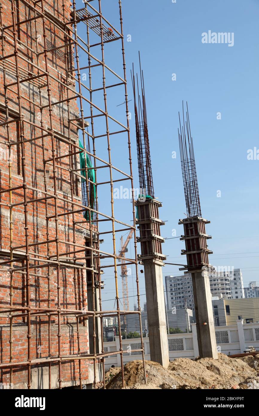 Workers under construction building project, Infrastructure projects ...