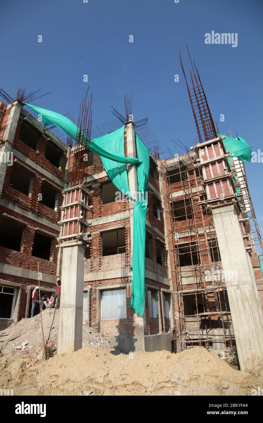 Workers under construction building project, Infrastructure projects ...