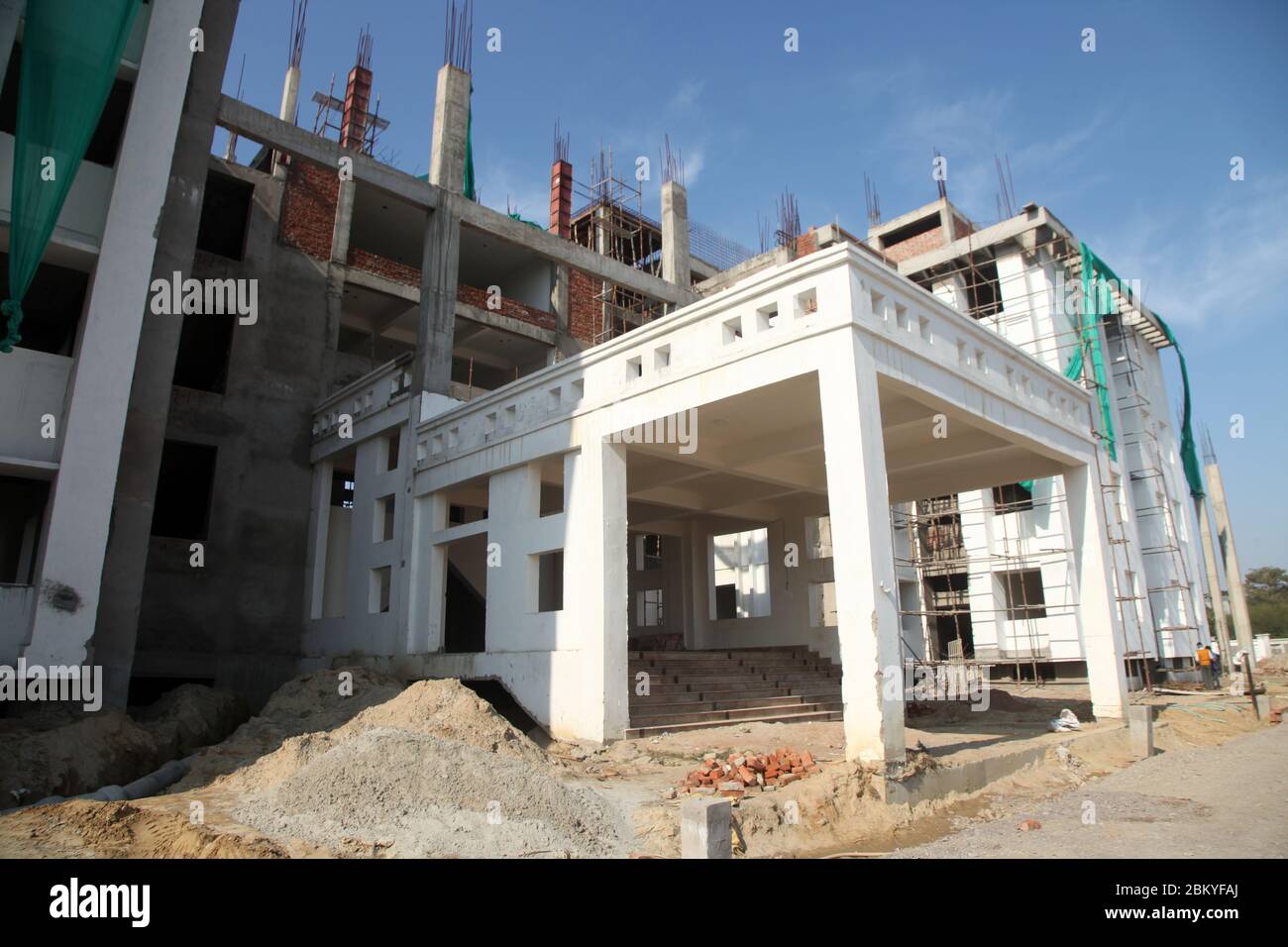 Workers under construction building project, Infrastructure projects ...