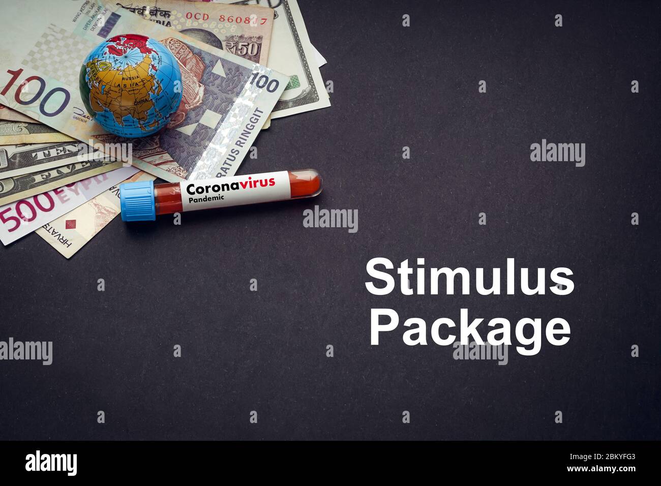 CORONAVIRUS STIMULUS PACKAGE text with currency banknotes, world globe ...