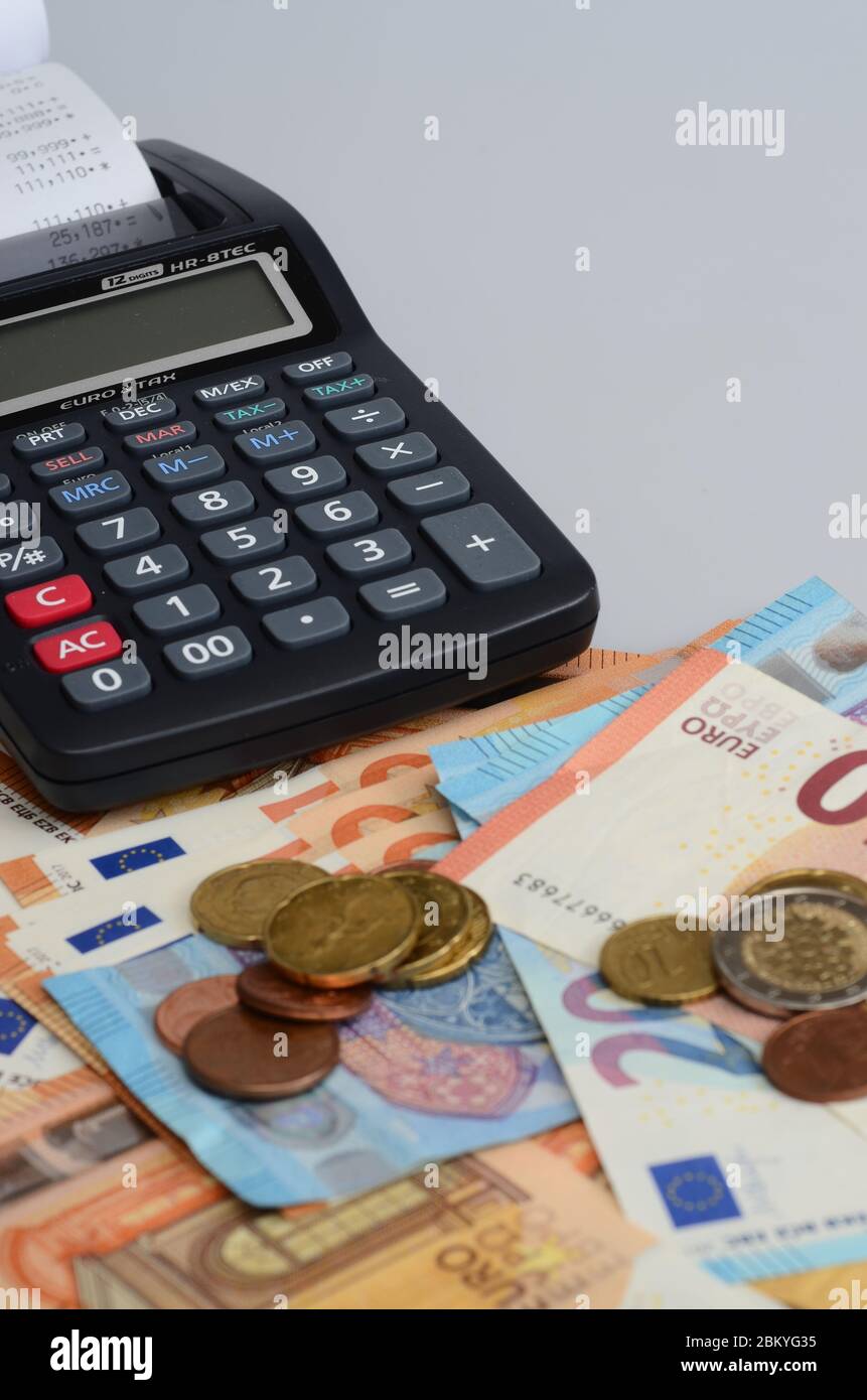 Calculator and euro cash bank notes, for accounting and treasury ...