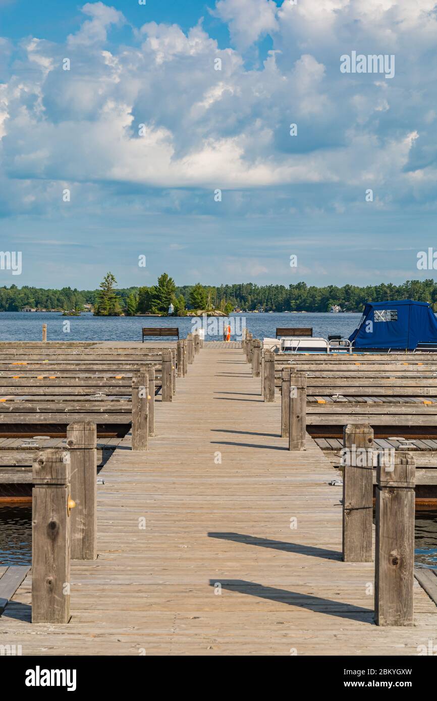 Wooden Docks and blue lake Stock Photo - Alamy