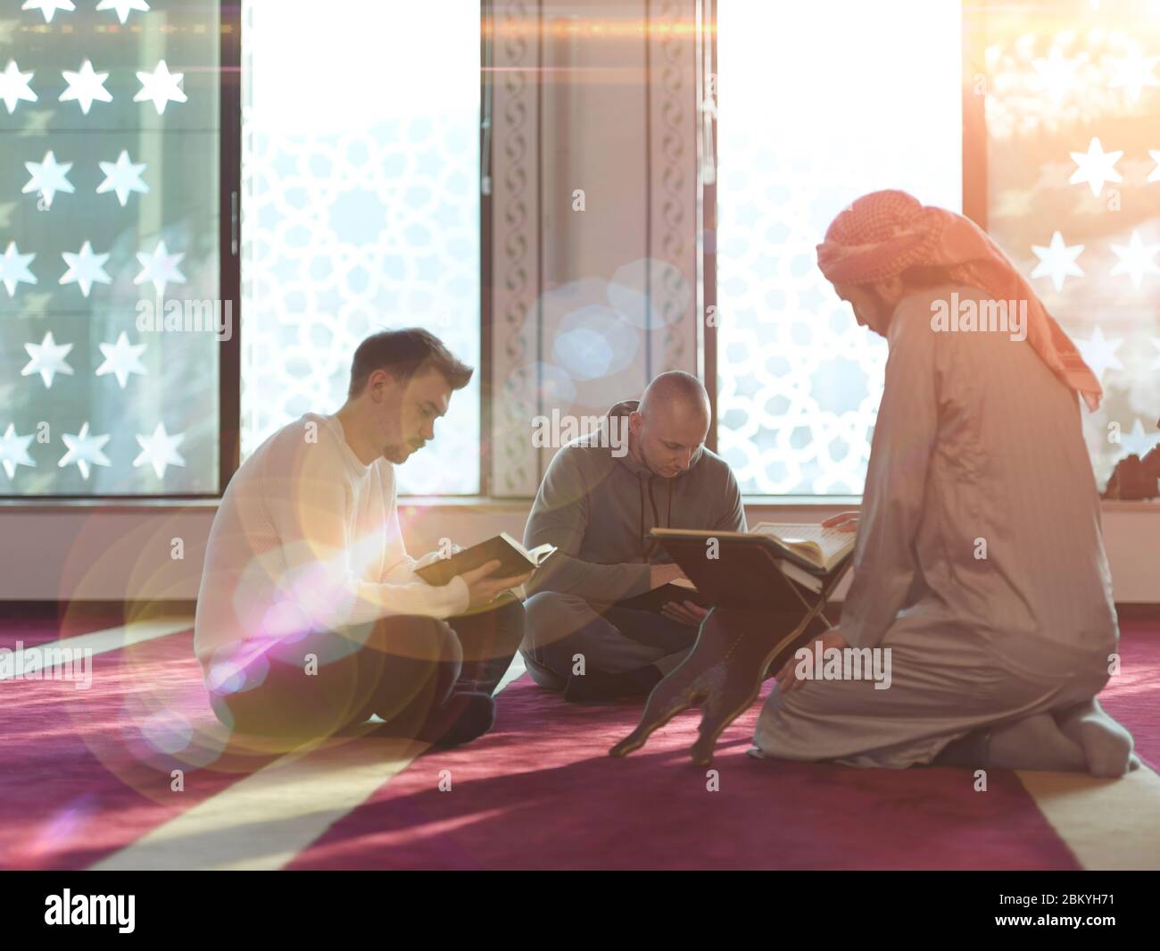 muslim people in mosque reading quran together concept of islamic ...