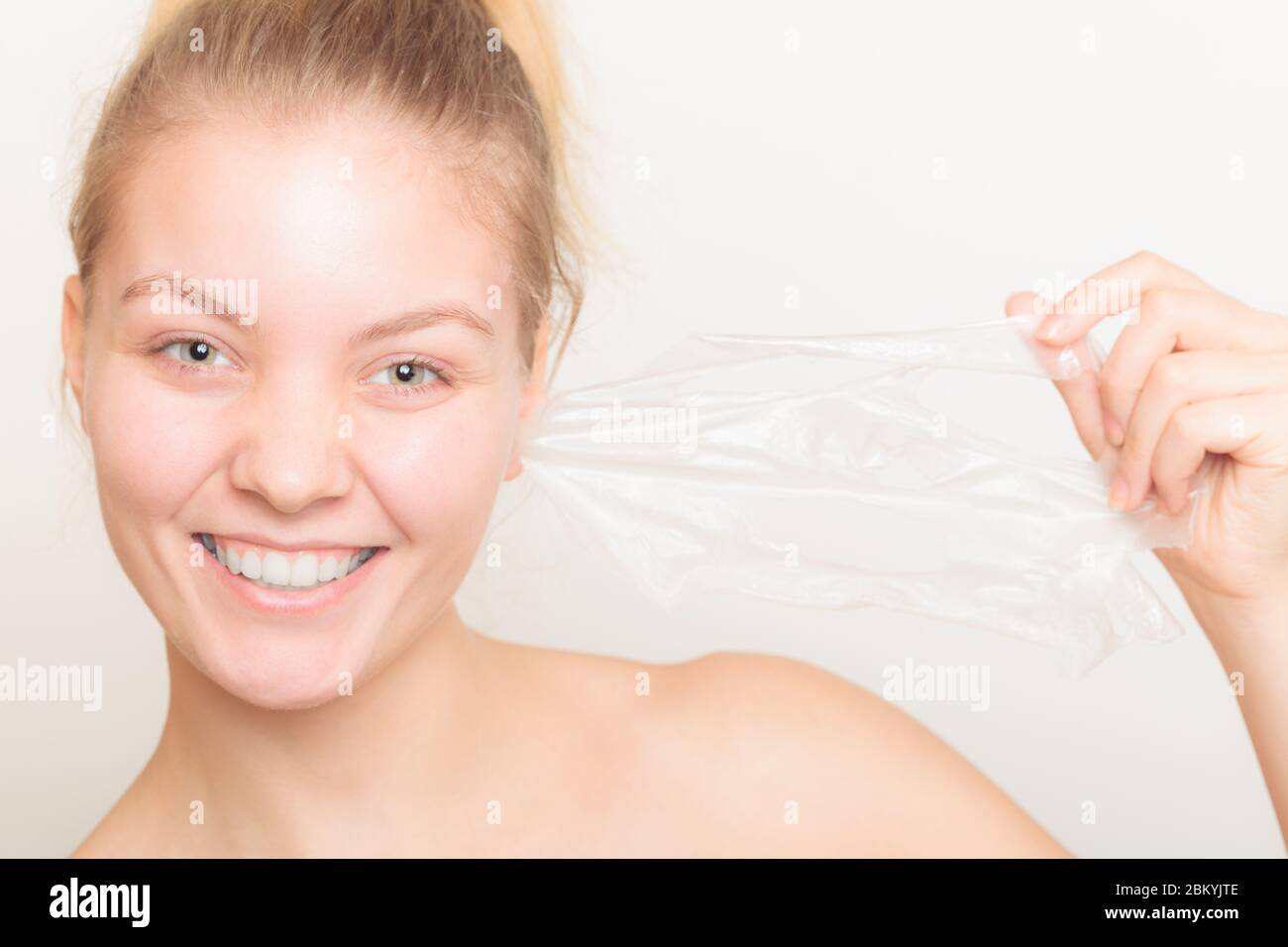 Beauty skin care cosmetics and health concept. Closeup young woman face ...