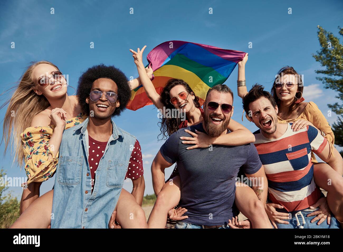 Three playful couples having great fun Stock Photo - Alamy